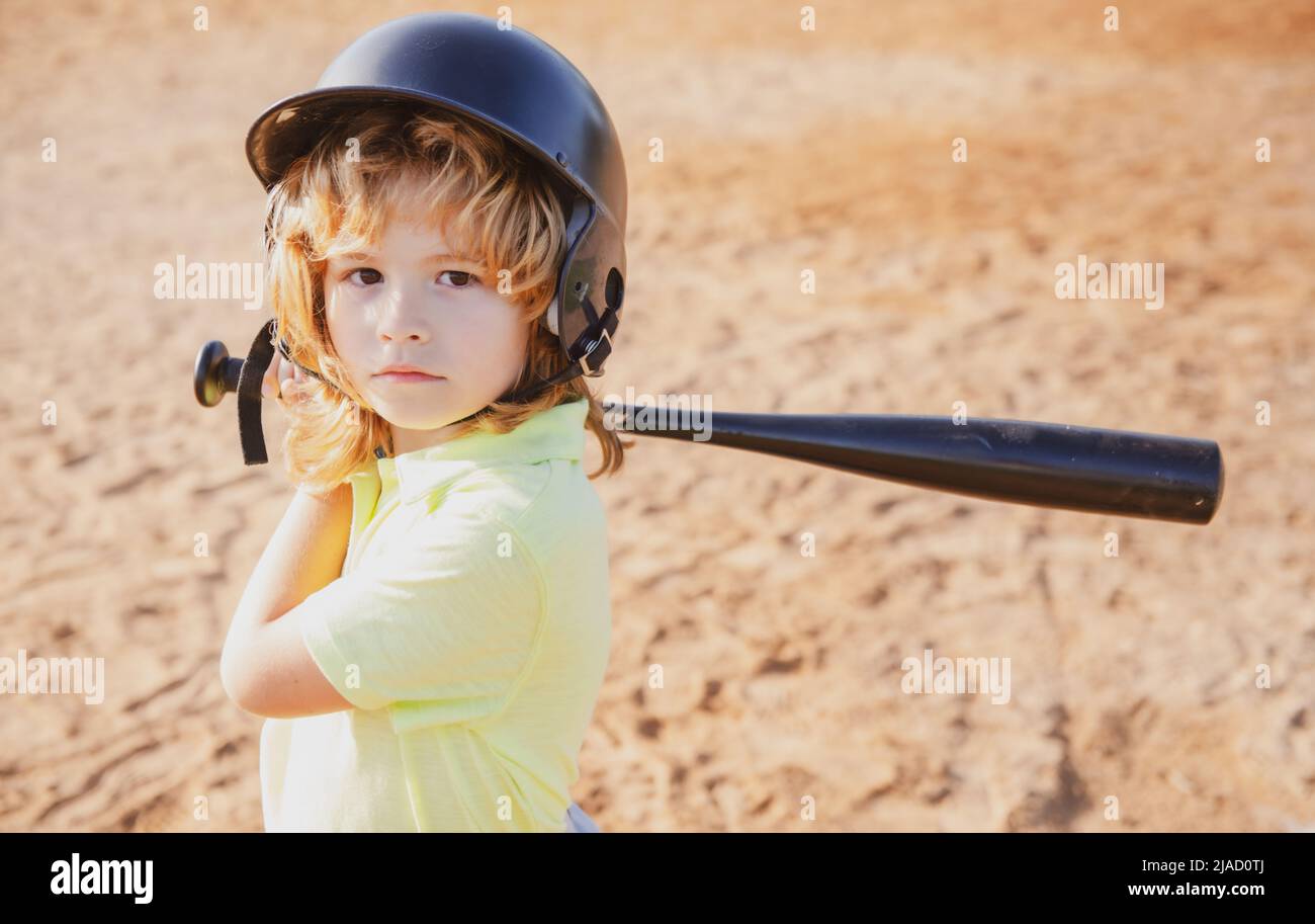 Kid holding a baseball bat. Pitcher child about to throw in youth ...