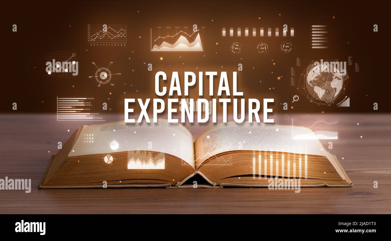 Business inscription coming out from an open book Stock Photo - Alamy