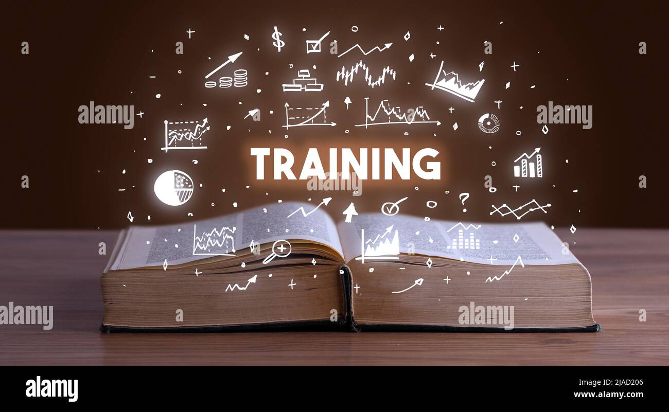 Business inscription coming out from an open book Stock Photo - Alamy