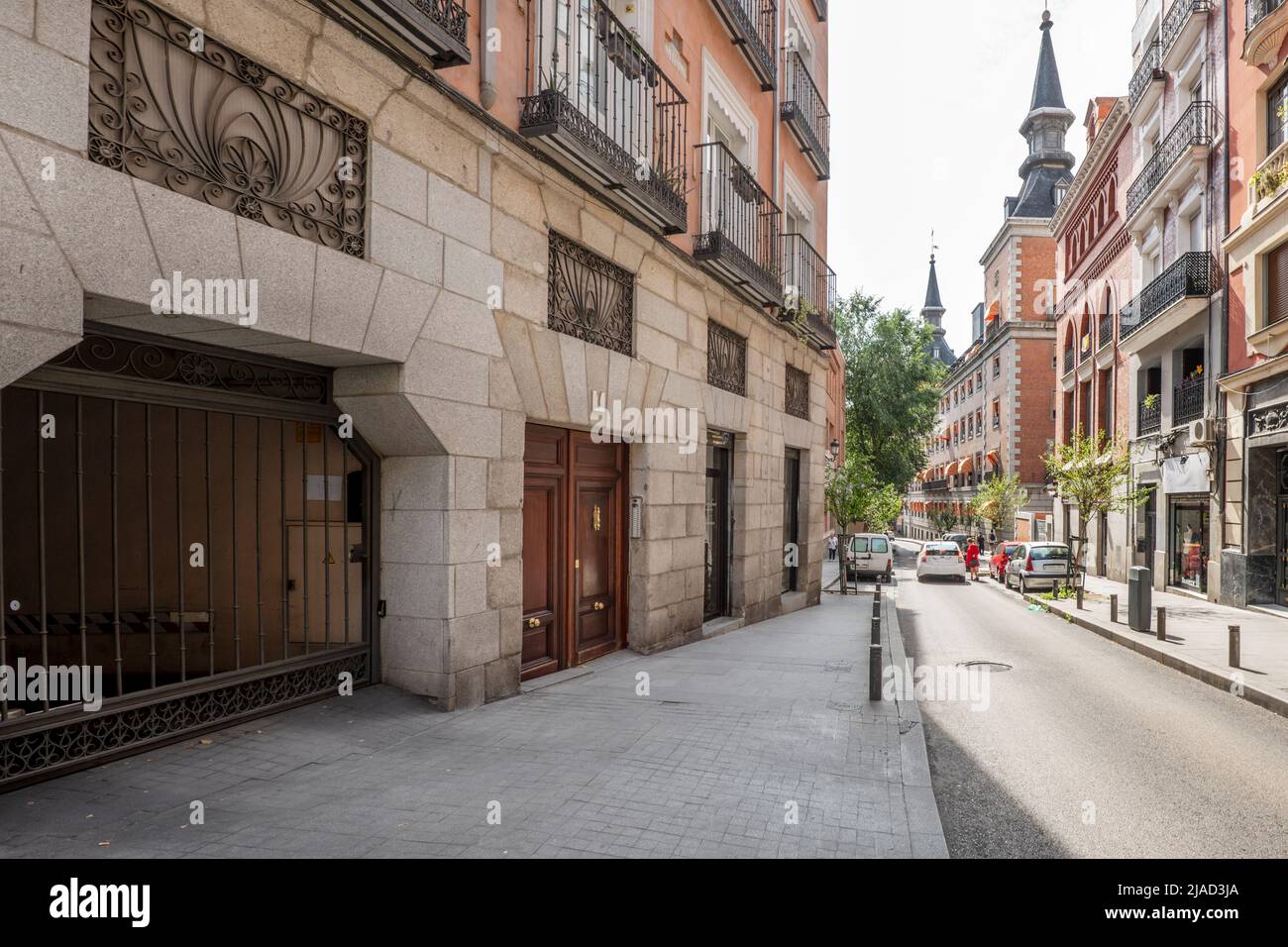 Central street in the city of Madrid with old buildings with large ...