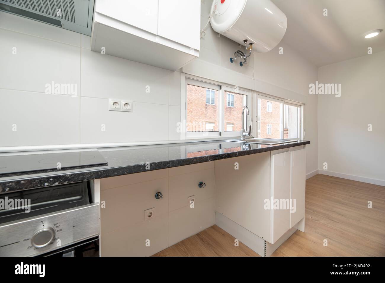 Space washing machine wooden cabinet hi-res stock photography and ...