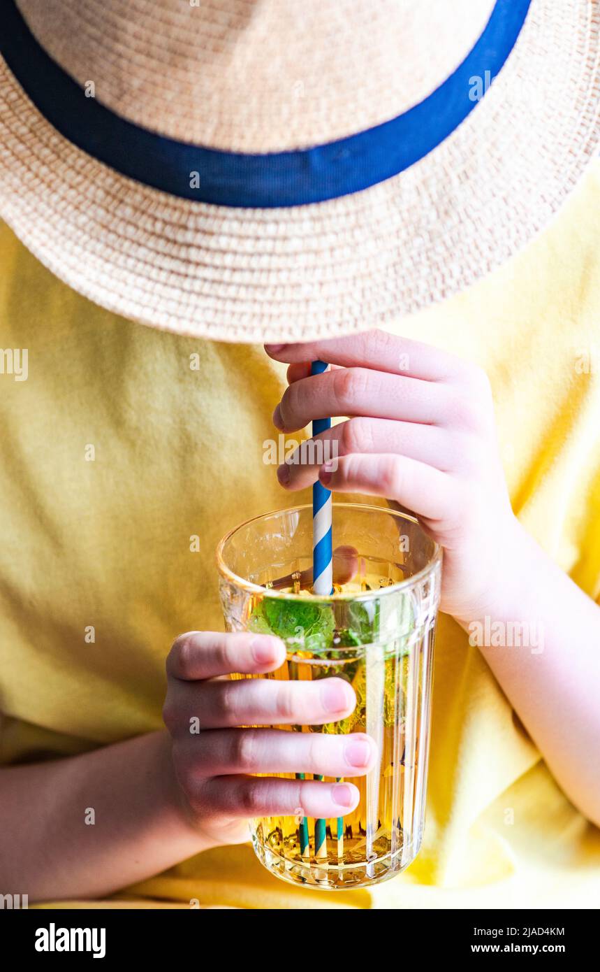 Cute boy drinking tea hi-res stock photography and images - Alamy