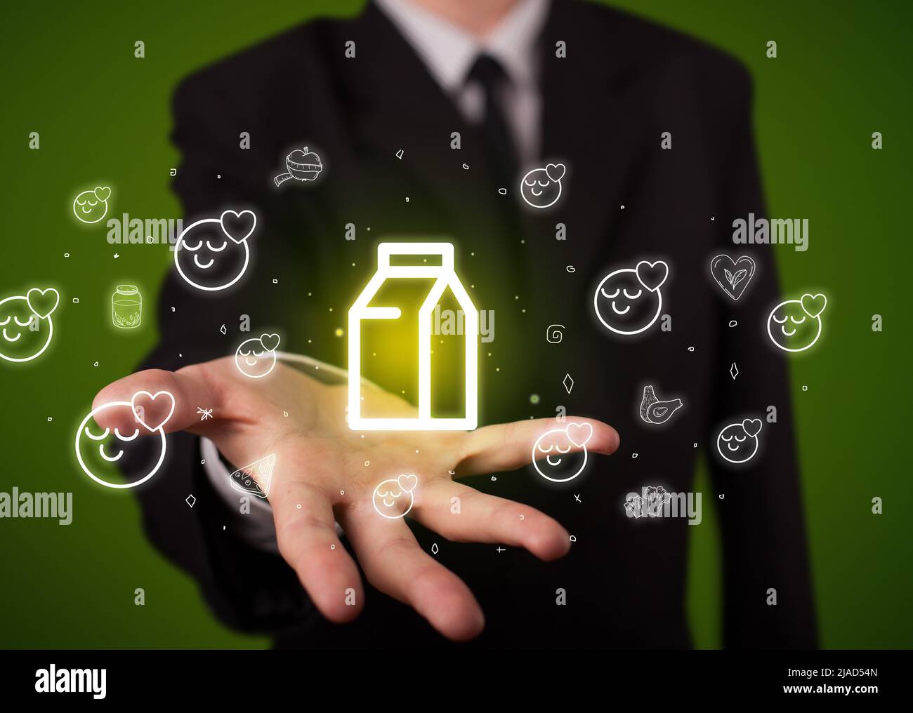 Hand holding food related icons Stock Photo - Alamy