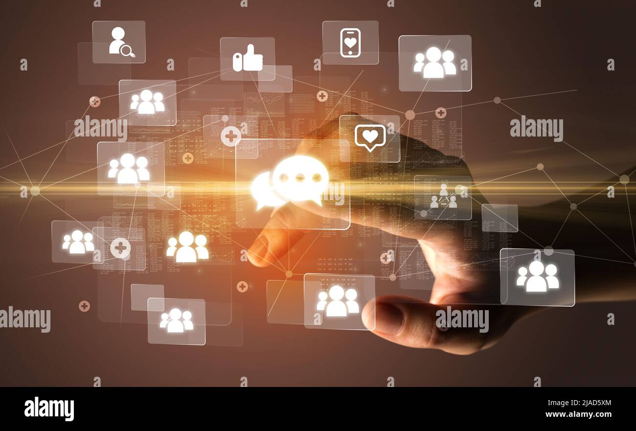 Hand pressing social media multimedia application screen with media ...