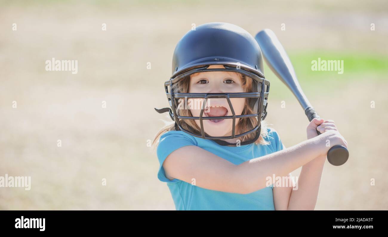 Portrait of excited kid baseball player wearing helmet and hold ...