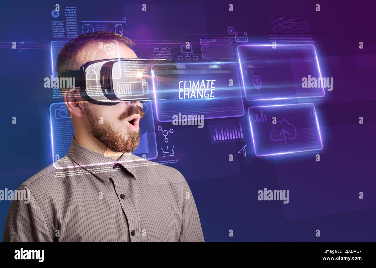 Businessman looking through Virtual Reality glasses, tech concept Stock ...