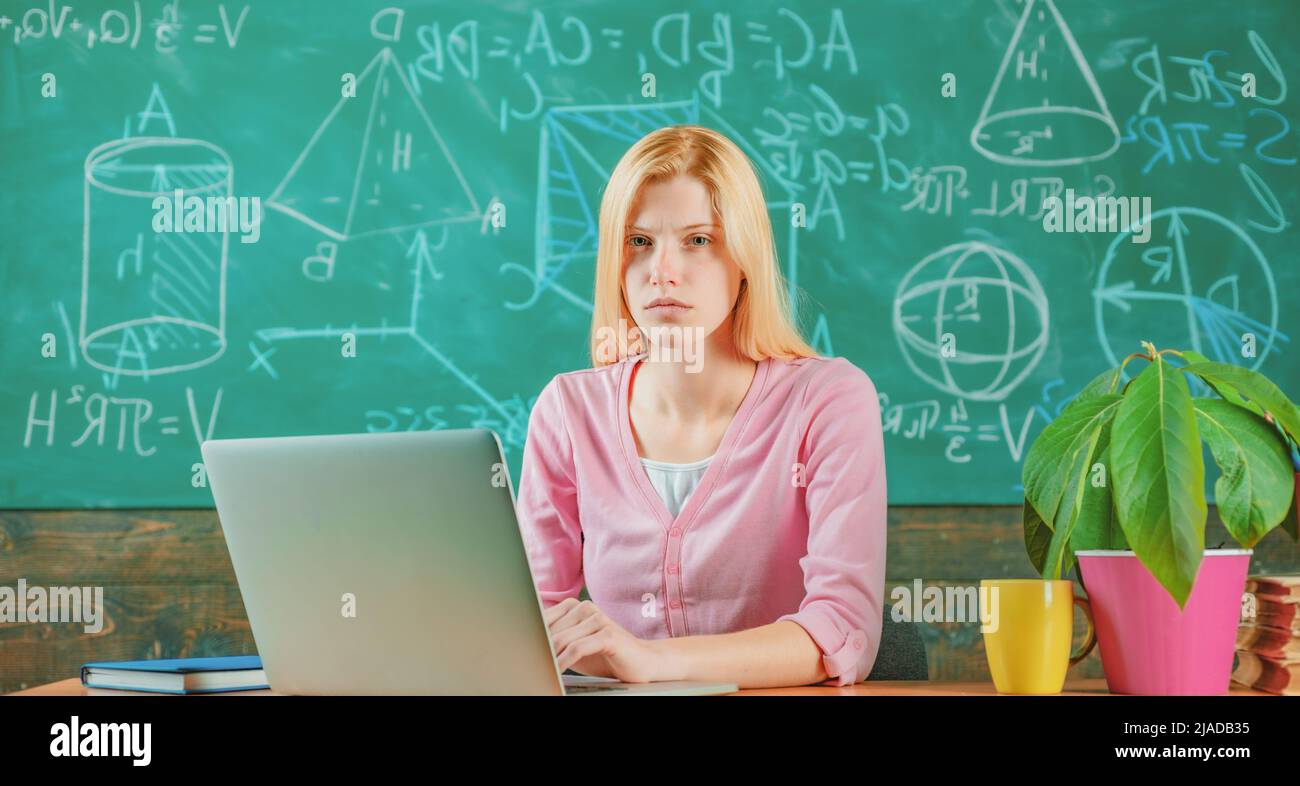 Portrait of teacher use laptop at school. Education concept Stock Photo ...