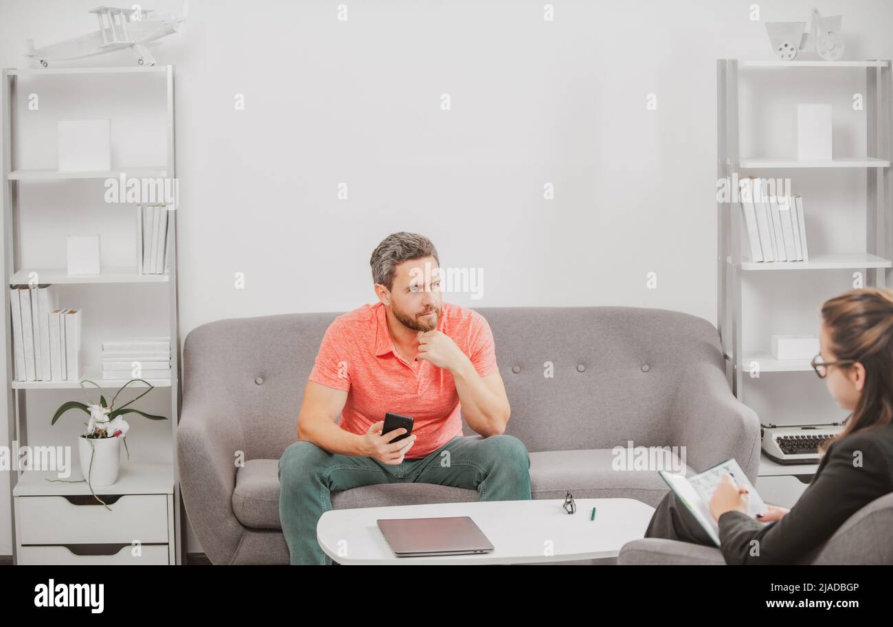 Psychologist helping young man to solve men problems. Psychological ...