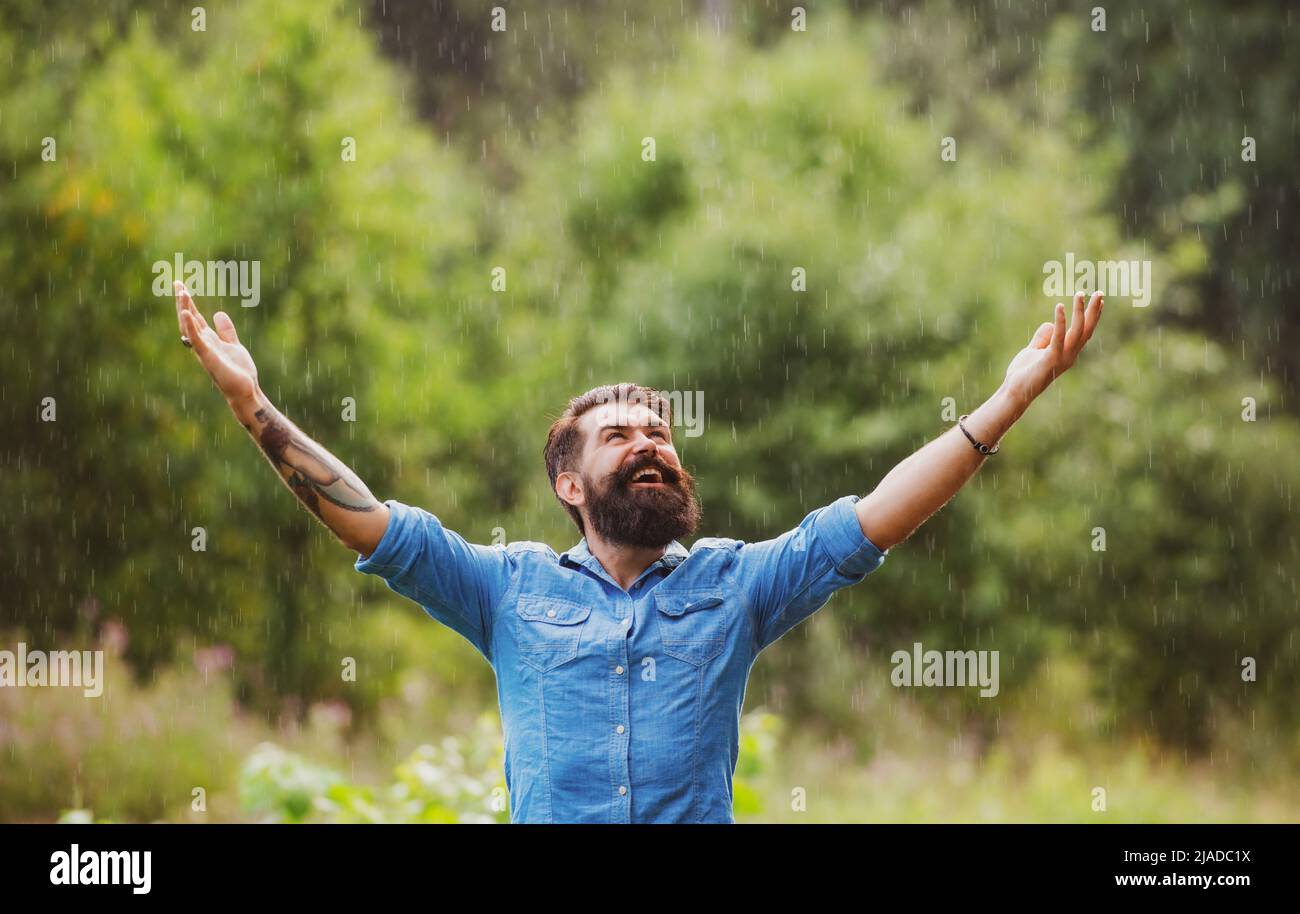 Relaxation and positive thinking. Stormy weather. Bearded man under ...