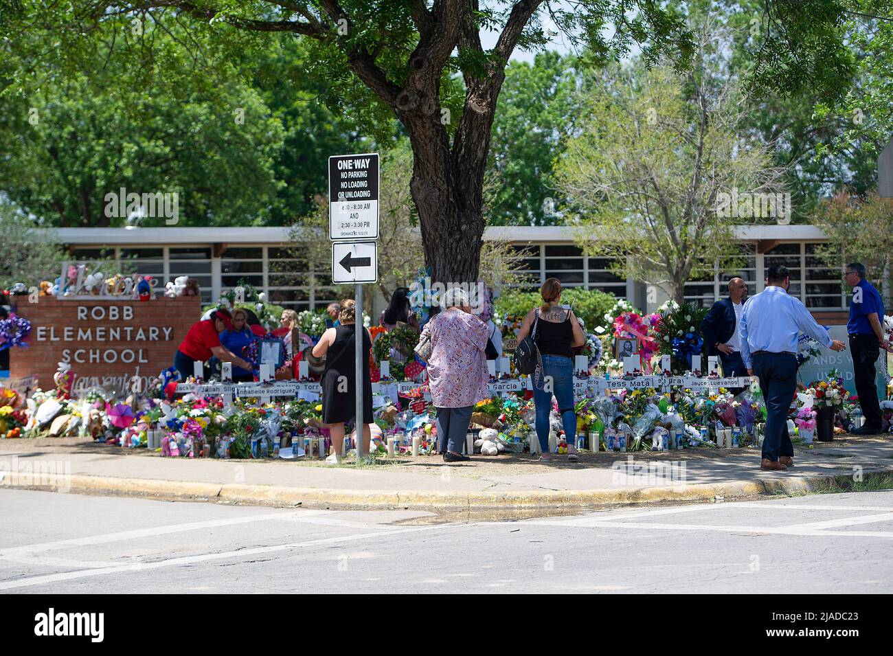 May 29, 2022: Residents gather outside of Robb Elementary School to pay ...