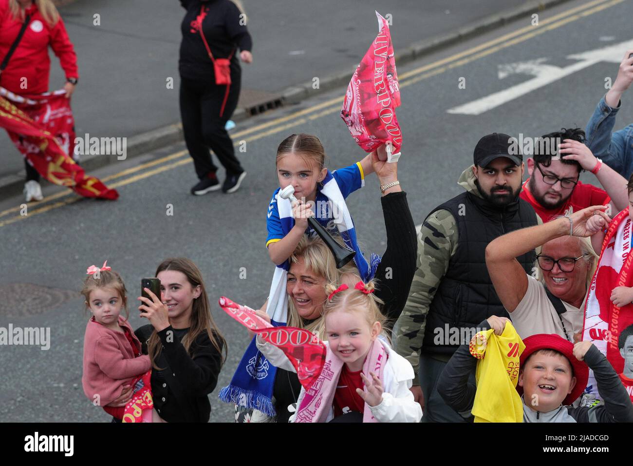 An Everton fan joins in the celebrations as the Liverpool FC squad make ...