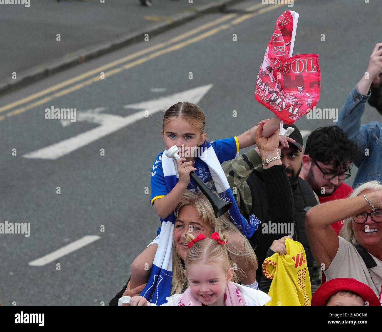 An Everton fan joins in the celebrations as the Liverpool FC squad make ...