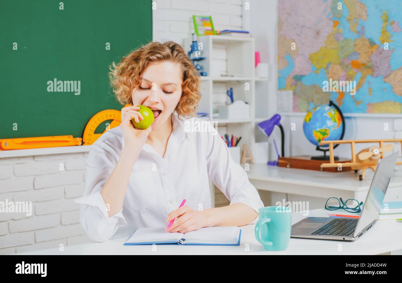 School lunch. Teacher eat in classroom. Education and learning ...
