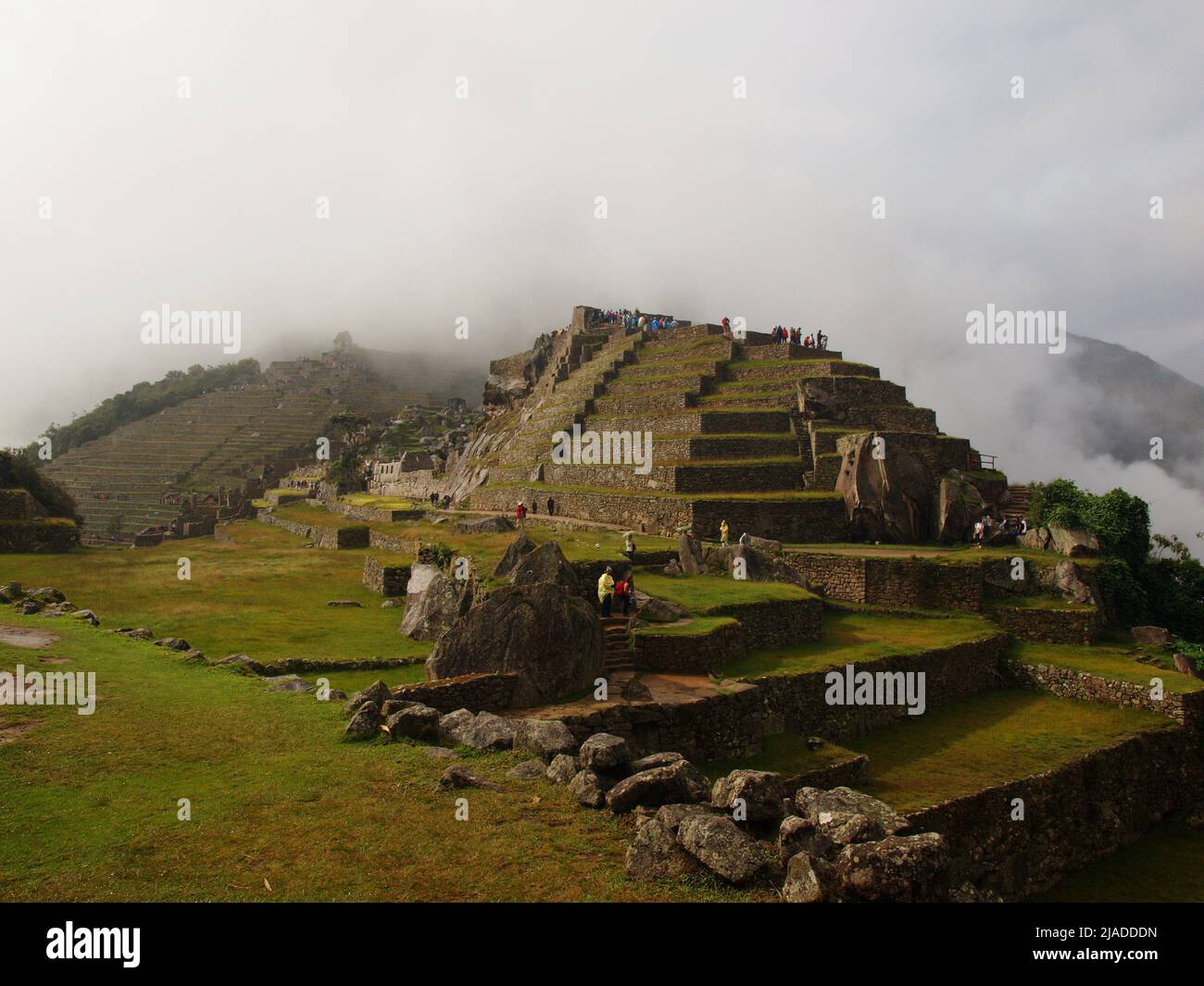 Platforms and stone Inca buildings at Machu Picchu ruins Stock Photo ...