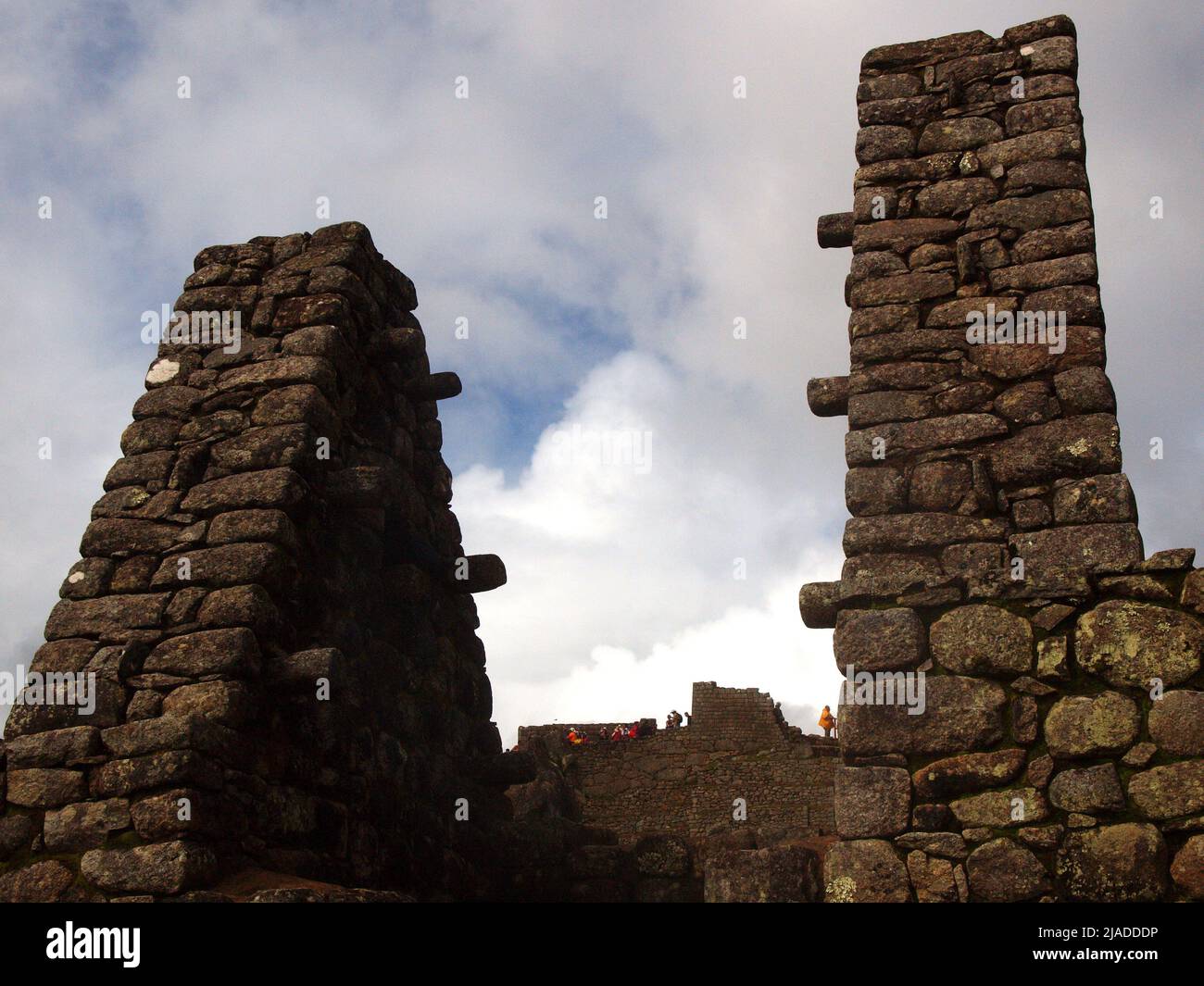 Stone Inca buildings at Machu Picchu ruins Stock Photo - Alamy