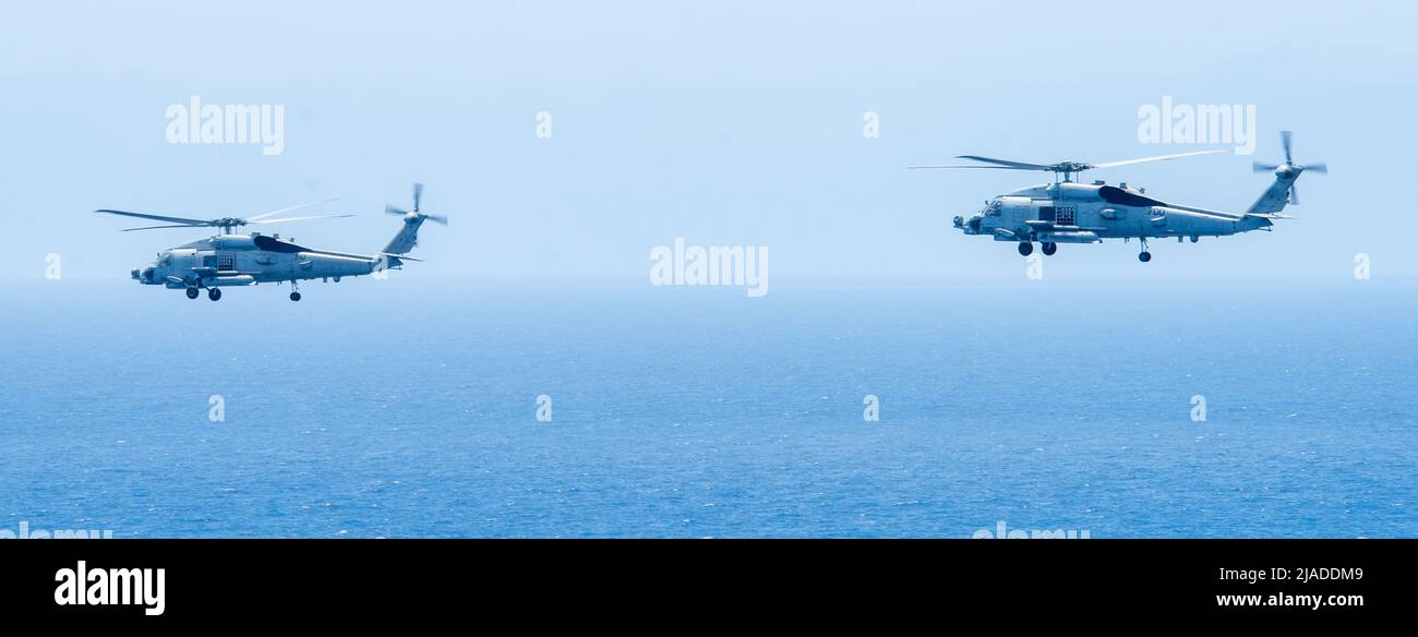 220529-N-BR419-1254 PHILIPPINE SEA (May 29, 2022) Two MH-60R Sea Hawks ...