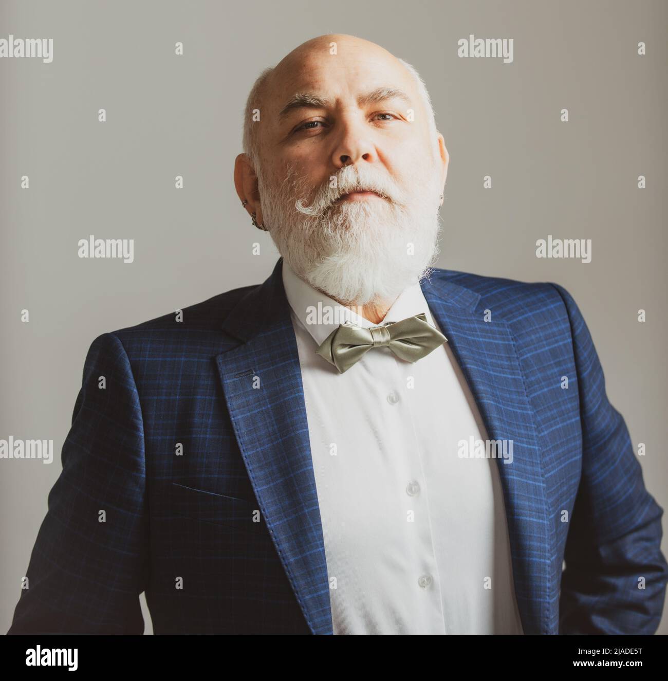 Senior Man. Closeup portrait of an elegant senior man with grey hair ...