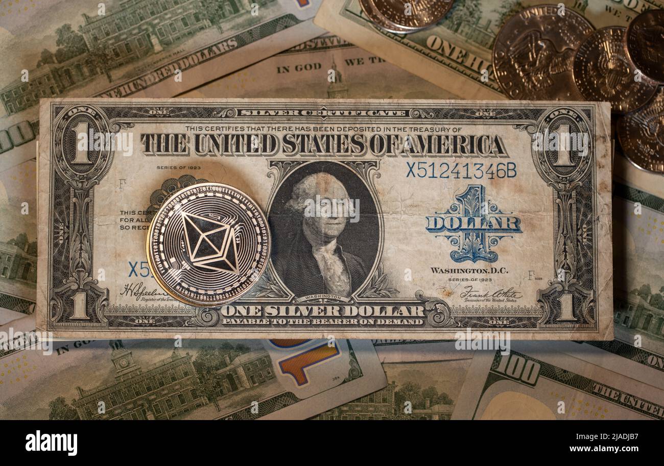 Ethereum coin on historic one US Dollar bill. Silver Certificate Dollar ...
