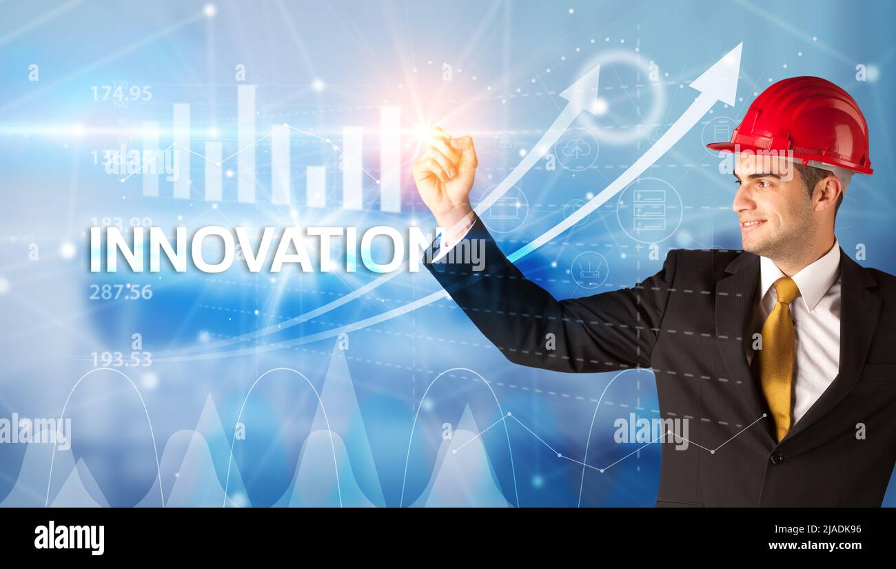 Young Businessman with helmet concept Stock Photo - Alamy