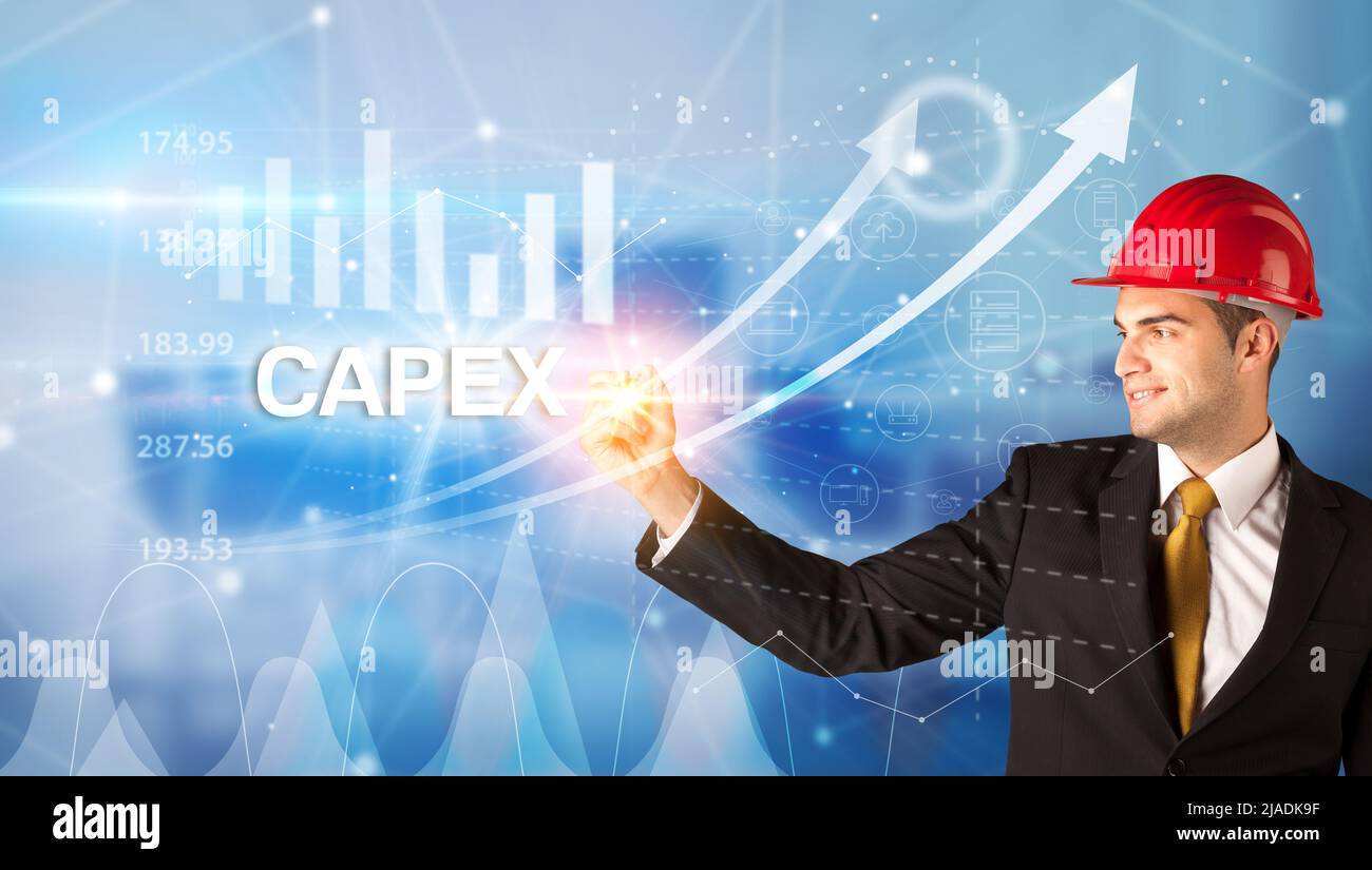 Young Businessman with helmet concept Stock Photo - Alamy