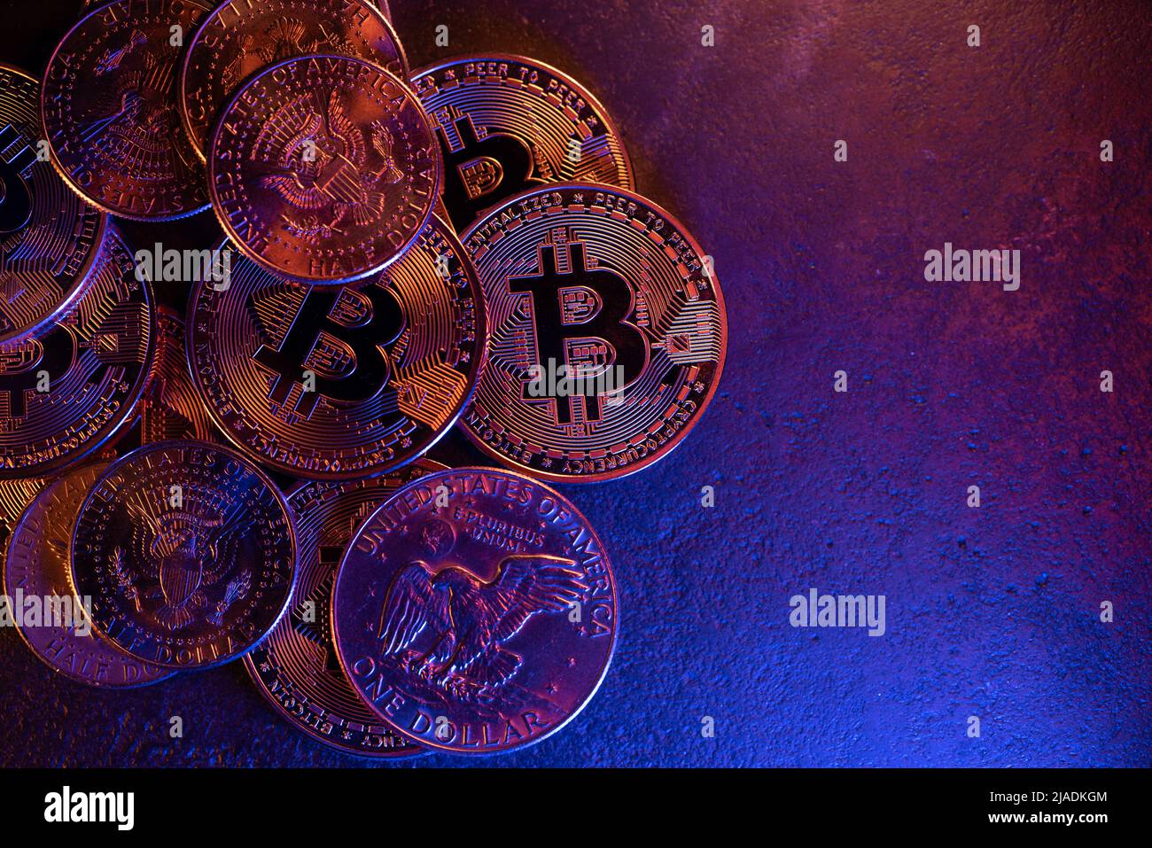 Bitcoin crypto currency with Eisenhower Dollar coin under colorful ...