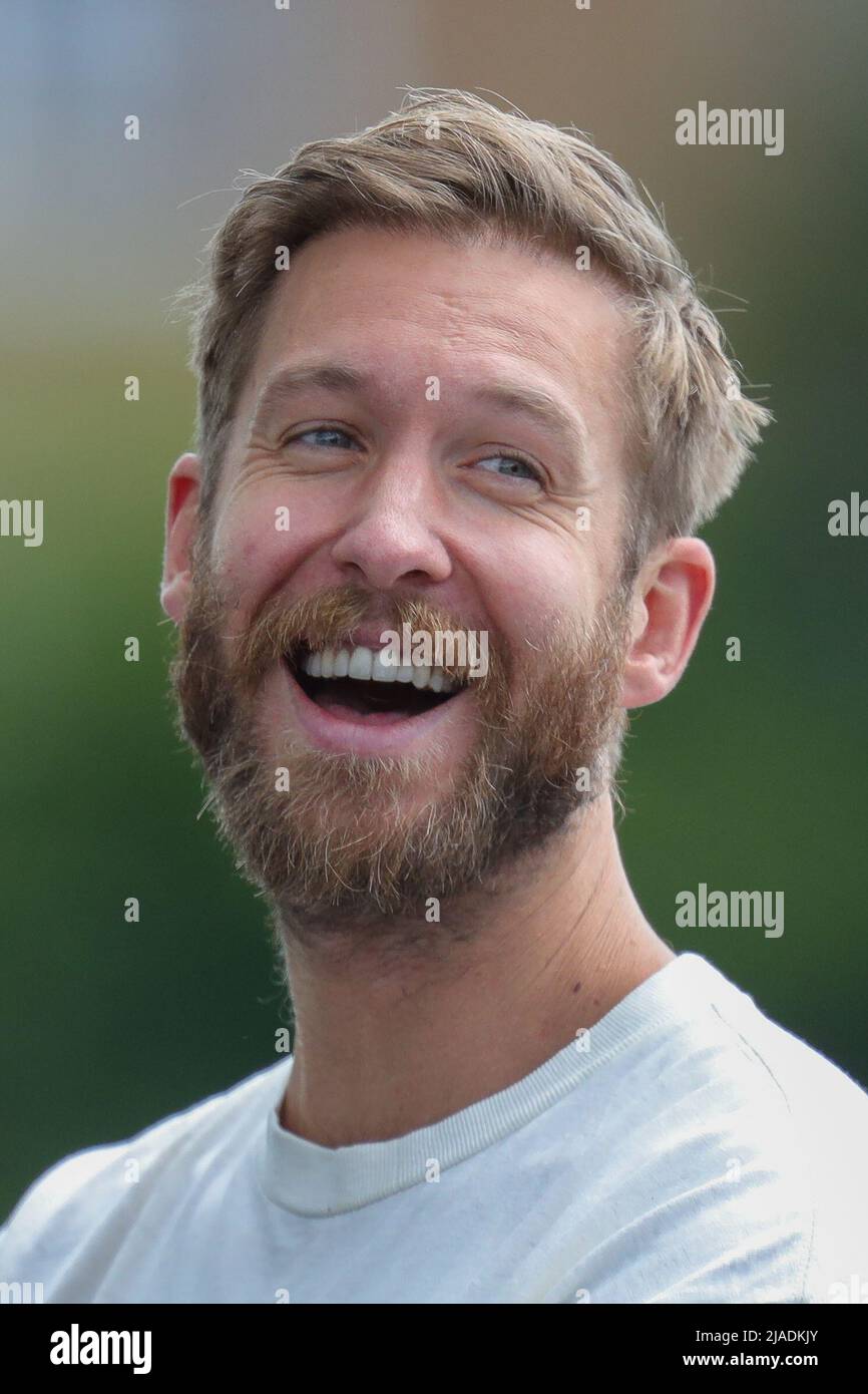 Scottish DJ Calvin Harris performing for the Liverpool FC open top bus ...
