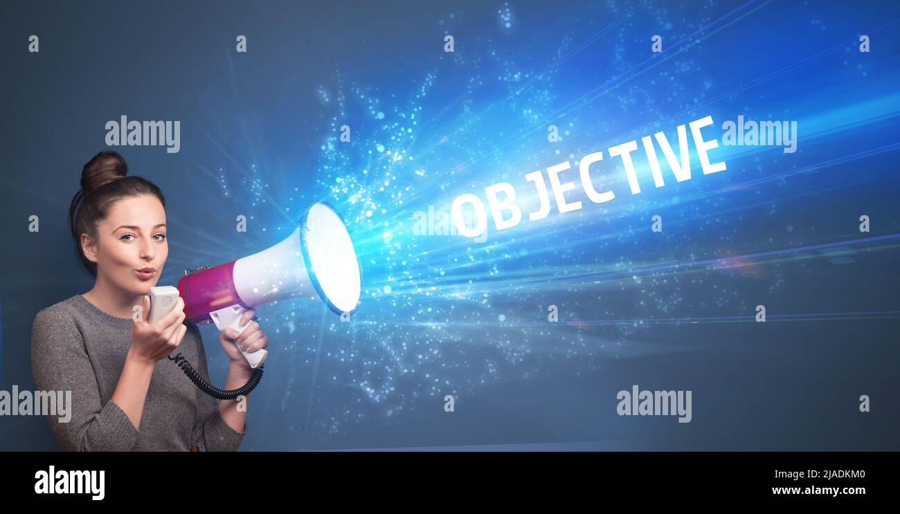 Young person shouting in loudspeaker Stock Photo - Alamy