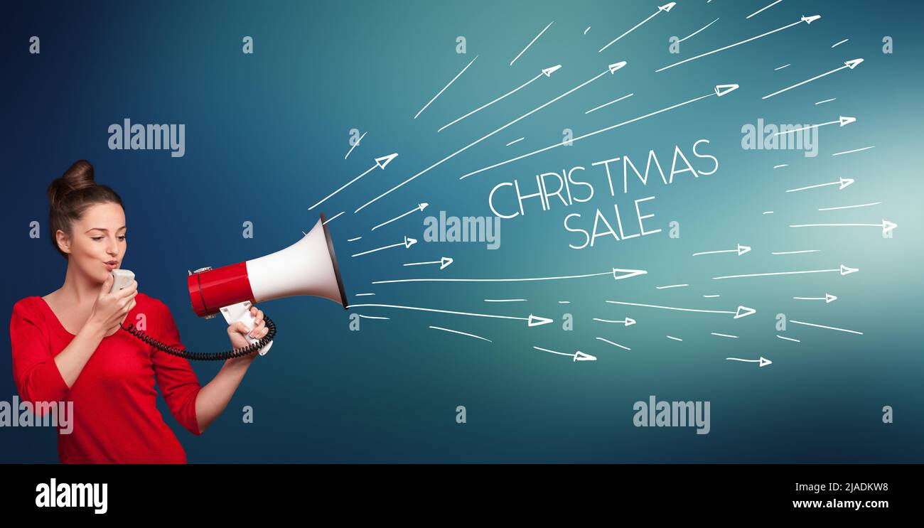 Young girl screaming to megaphone Stock Photo - Alamy