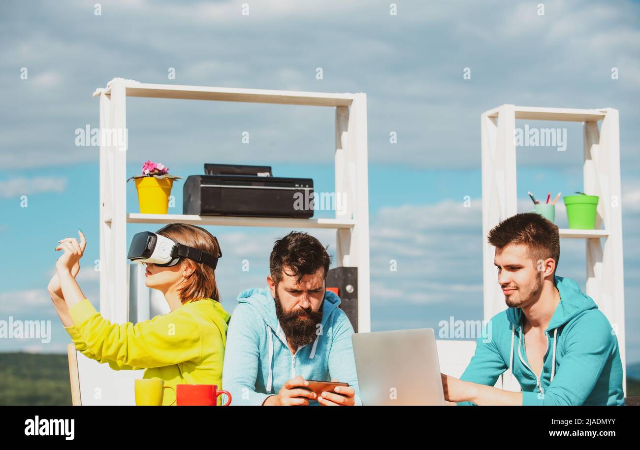 VR, technology and business concept. Team of three professional male ...