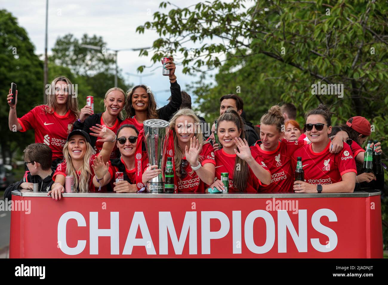 The Liverpool FC Women celebrate on the open top bus parade after ...