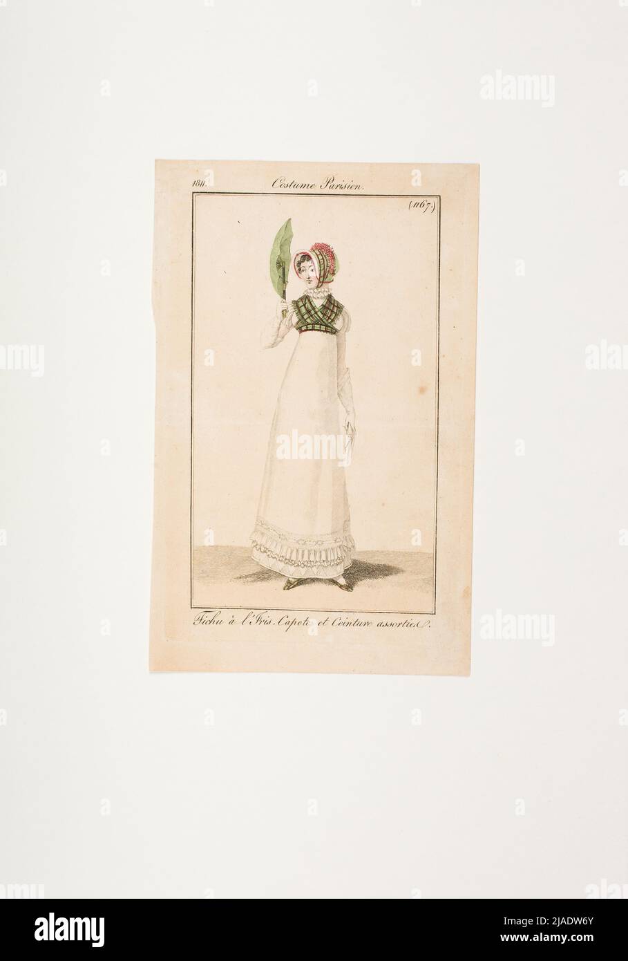 Fashion image: "Parisian in a promenade suit with a sideways folded up ...