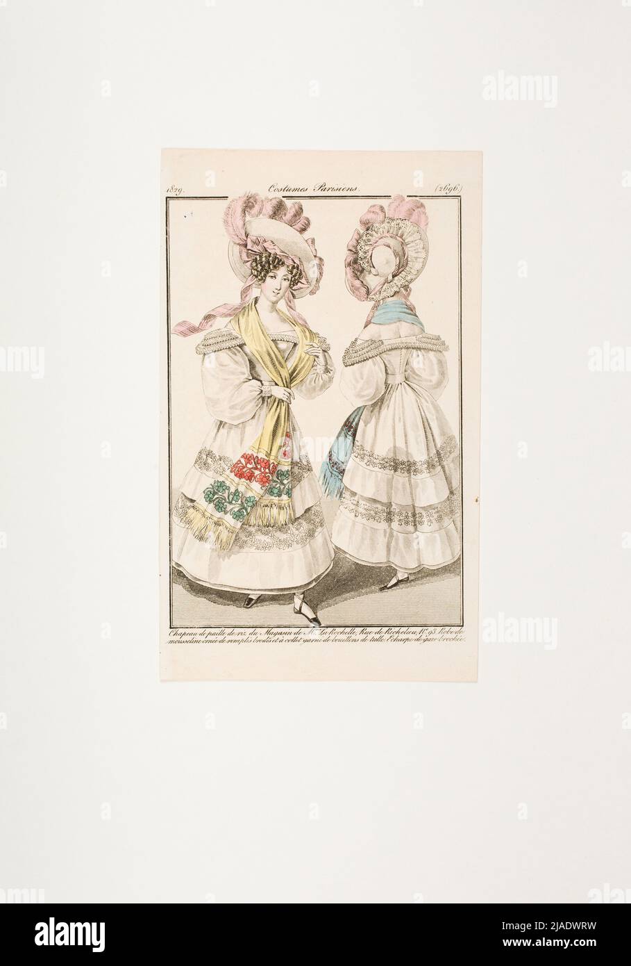 Fashion image: two figures, white mussel embroidering, hats and scarves ...