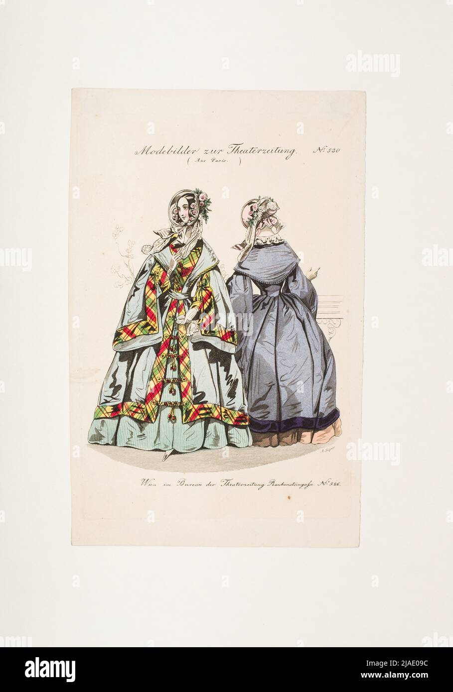 Fashion image: two figures, women's coats. Unknown Stock Photo - Alamy