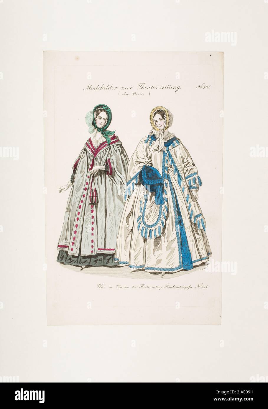 Fashion image: two figures, women's coats. Unknown Stock Photo - Alamy