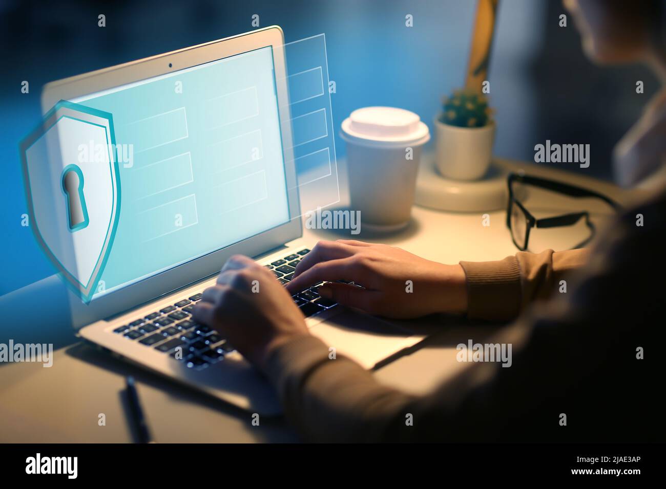 Woman using laptop with blocked screen at table. Concept of online ...
