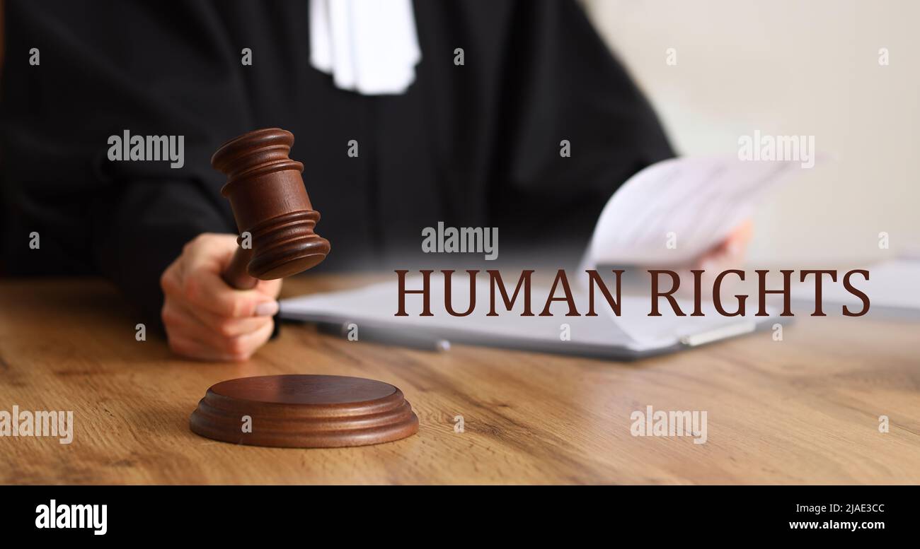 Female judge with gavel in courtroom. Human rights Stock Photo - Alamy