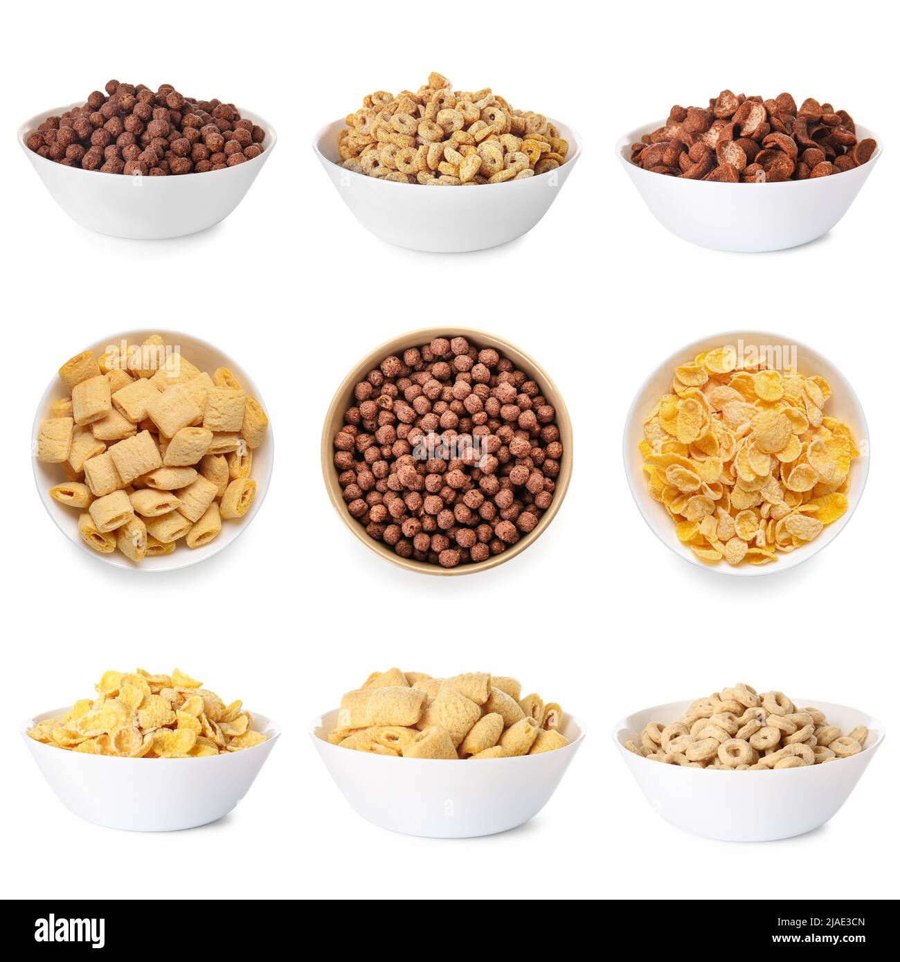 Set of bowls with different tasty breakfast cereals isolated on white ...