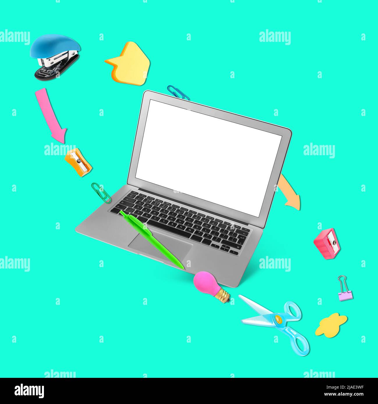 Flying modern laptop with blank screen and school supplies on turquoise ...