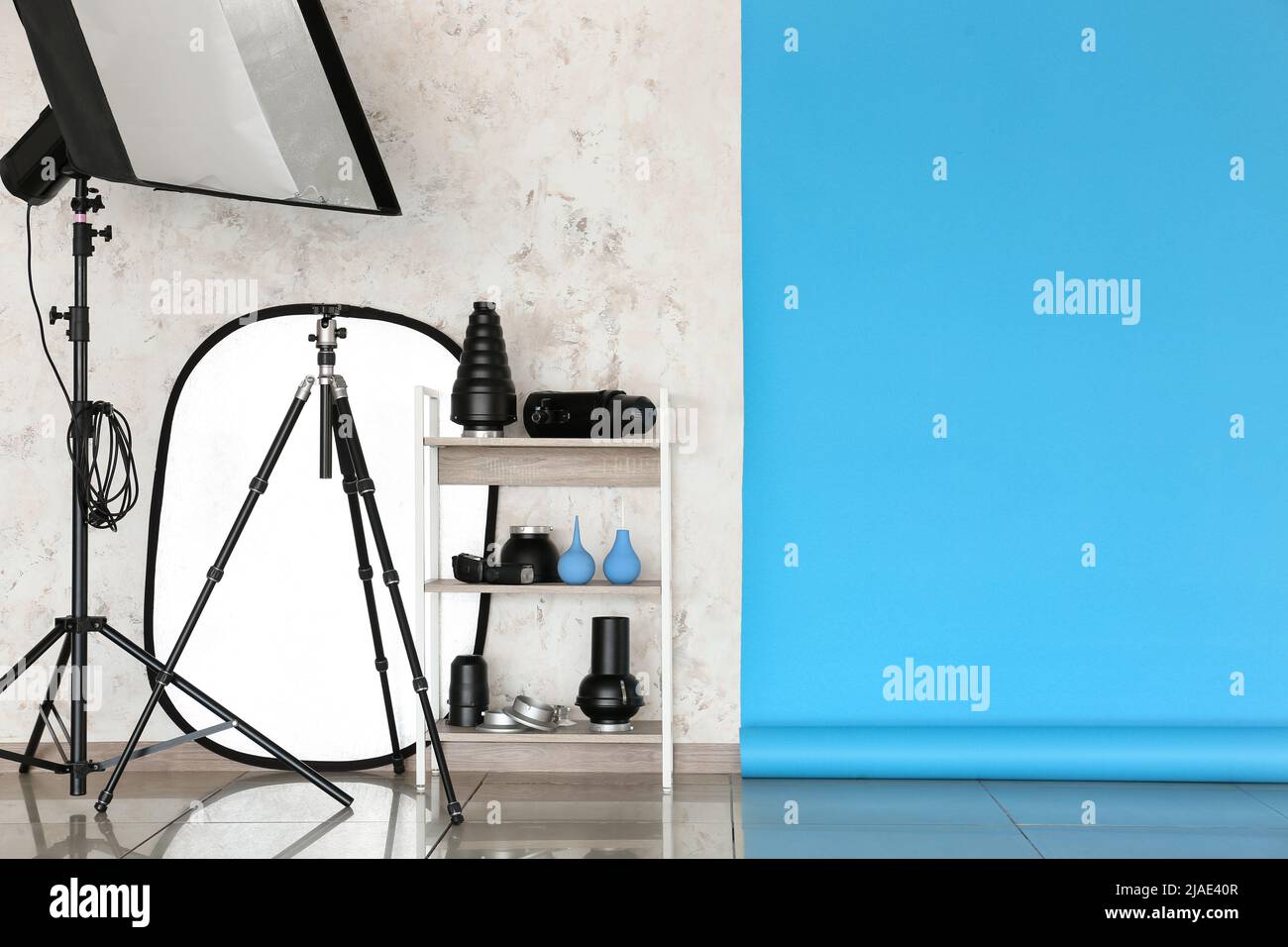 Lighting equipment and cyclorama in modern photo studio Stock Photo - Alamy