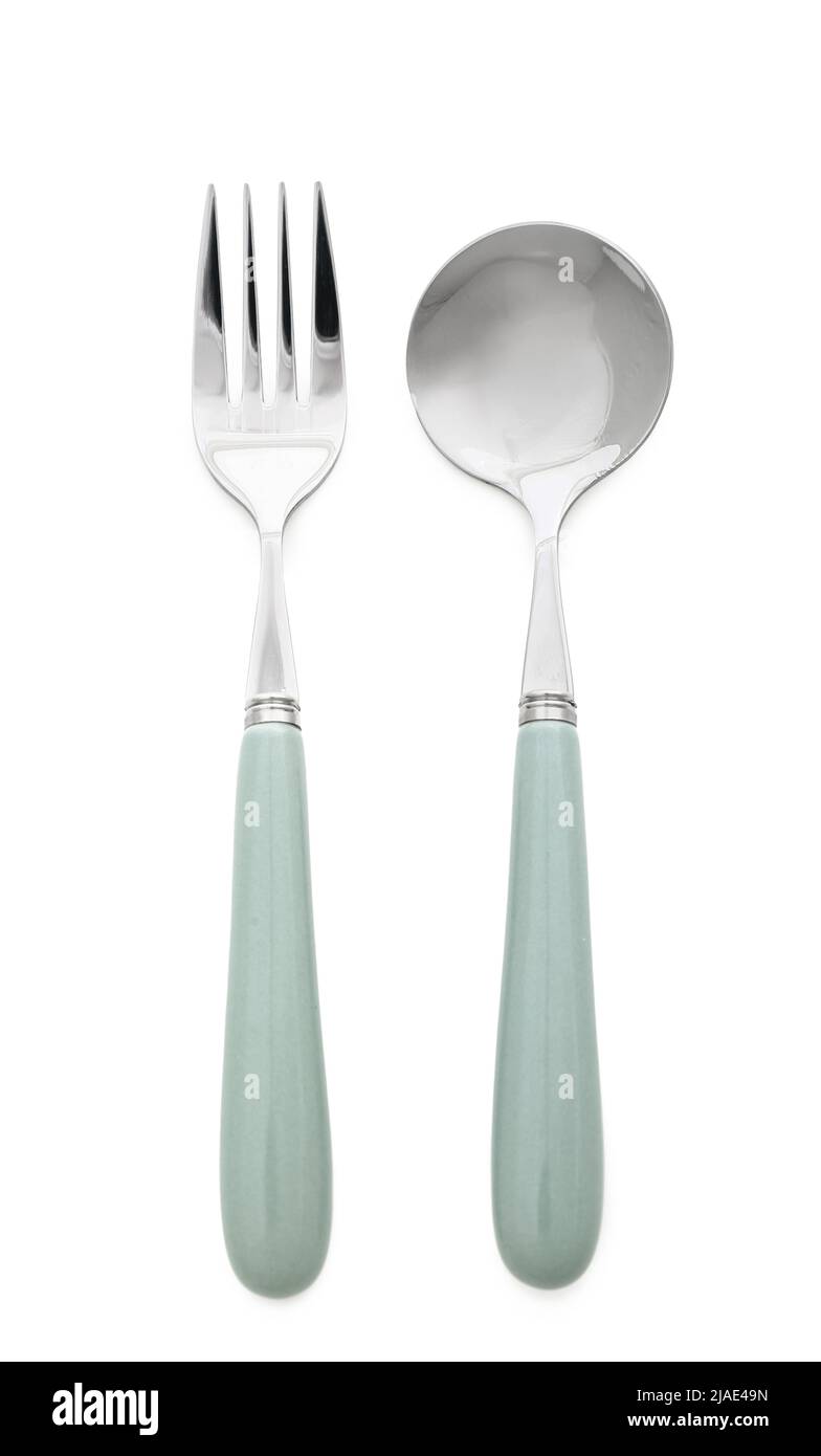 Stainless steel spoon and fork with grey handle on white background ...