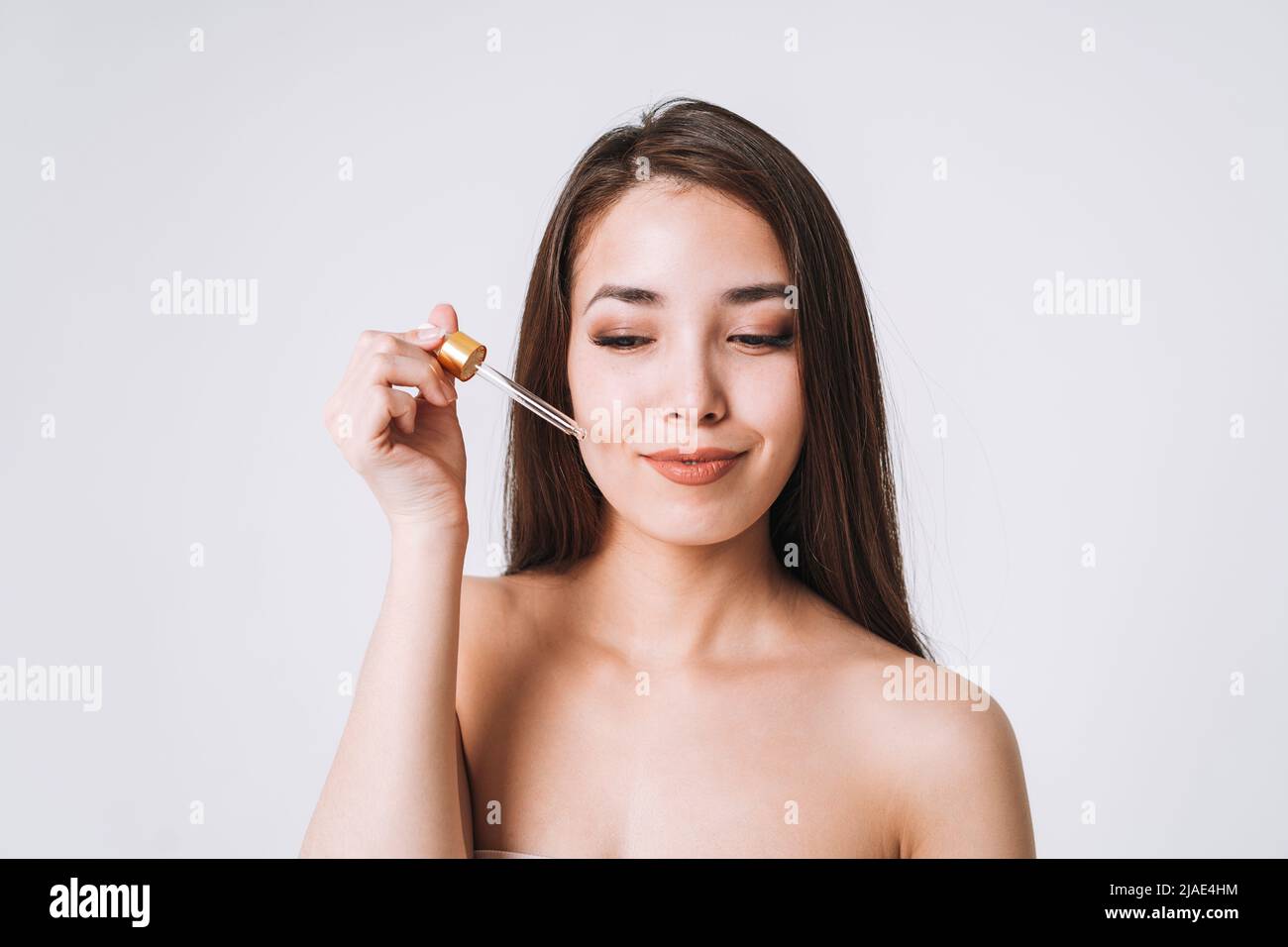 Beauty portrait of happy smiling asian woman with dark long hair with ...