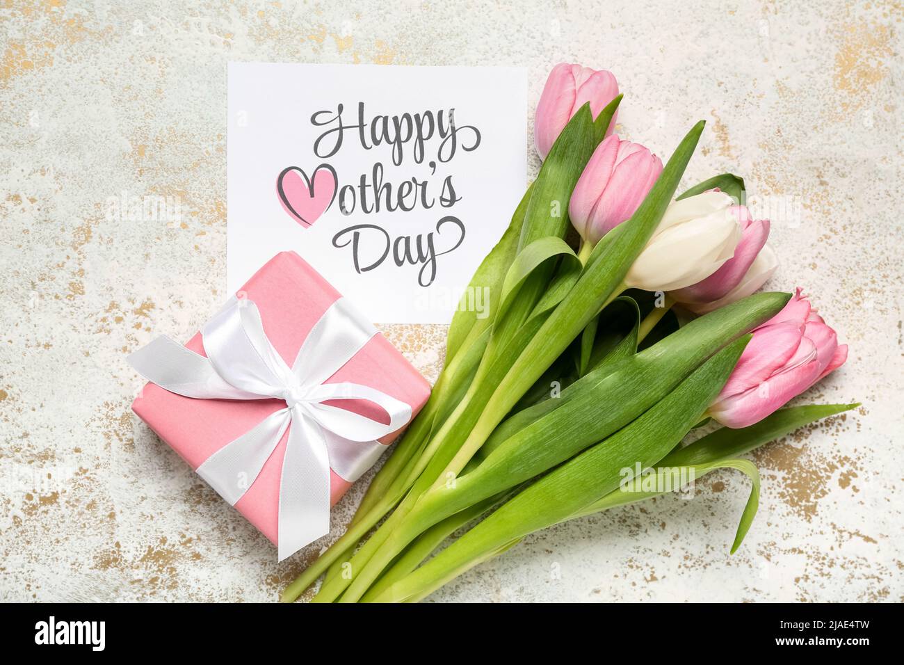 Card with text HAPPY MOTHER'S DAY, gift box and bouquet of tulips on ...