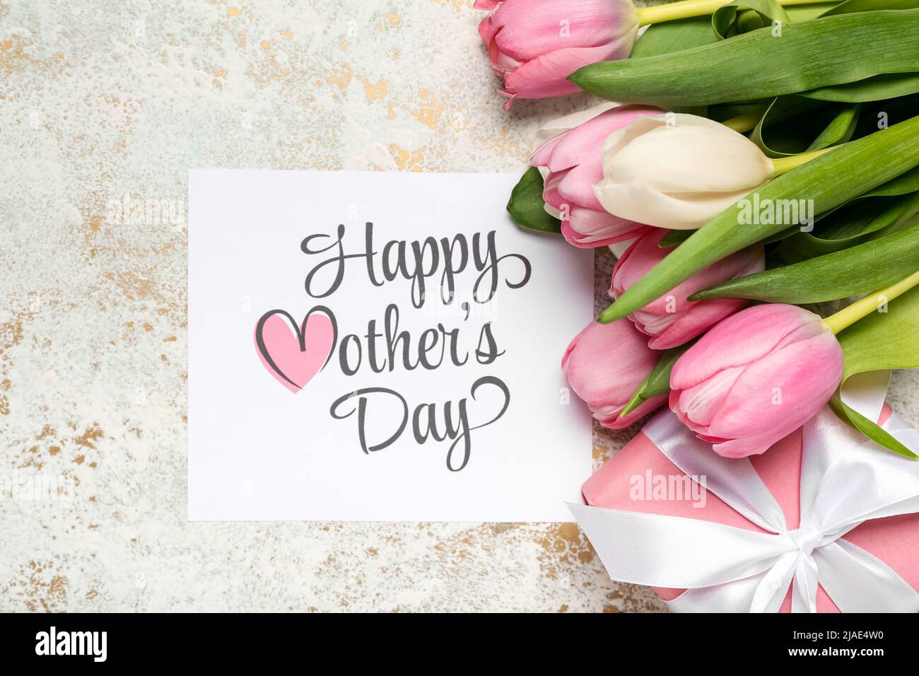 Card with text HAPPY MOTHER'S DAY, gift box and bouquet of tulips on ...