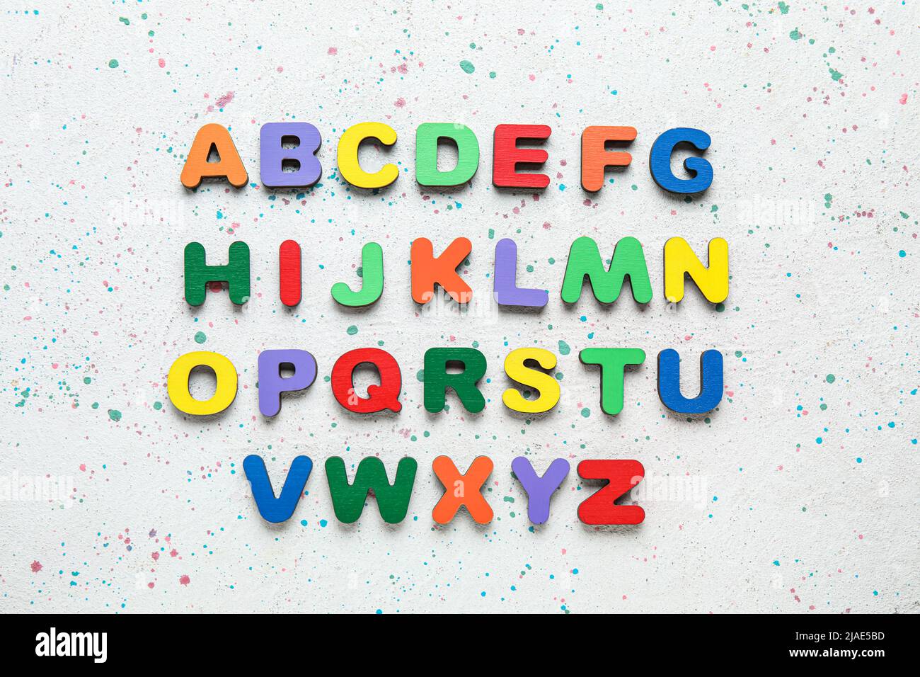 Colorful letters on grunge background. Alphabet concept Stock Photo - Alamy