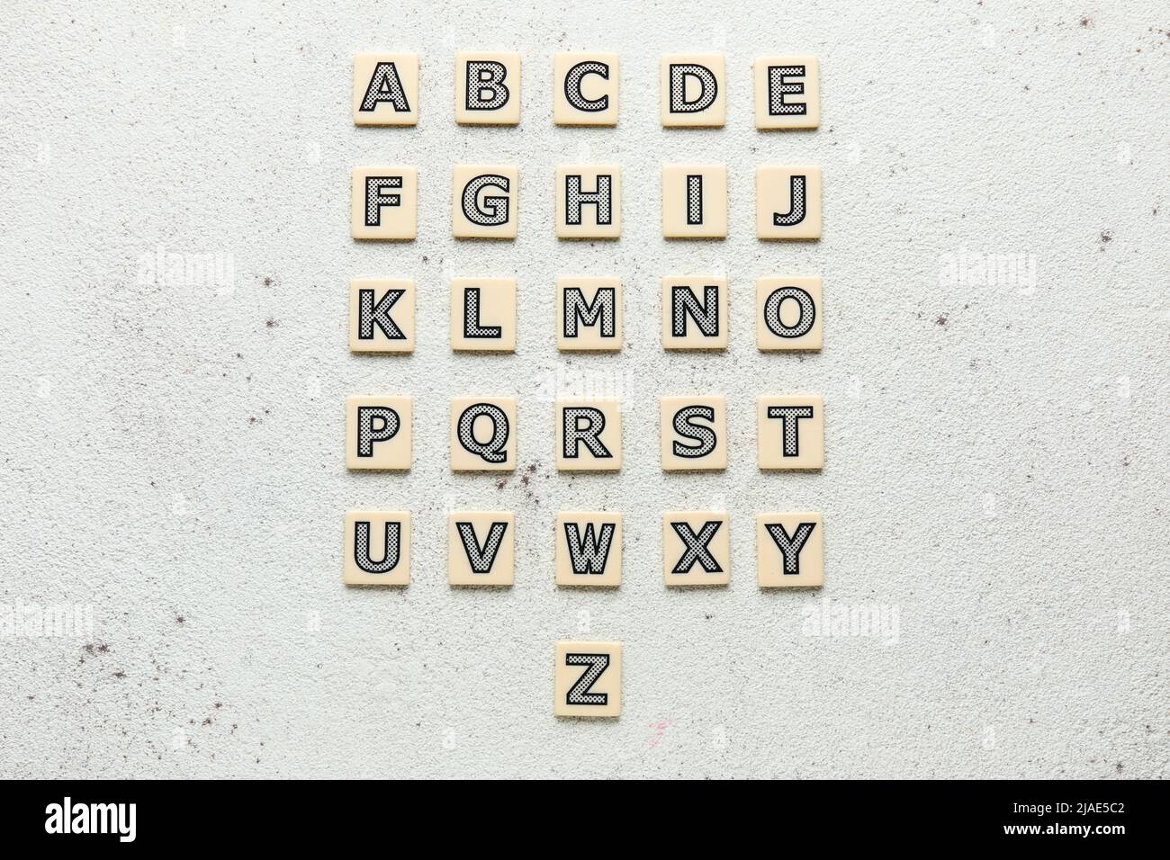 Different letters on white background. Alphabet concept Stock Photo - Alamy