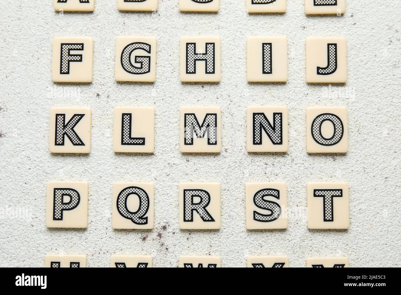 Different letters on white background. Alphabet concept Stock Photo - Alamy