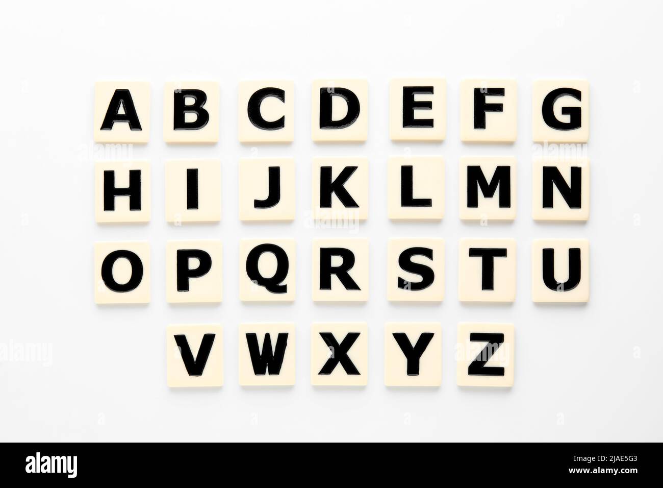 Different letters on white background. Alphabet concept Stock Photo - Alamy