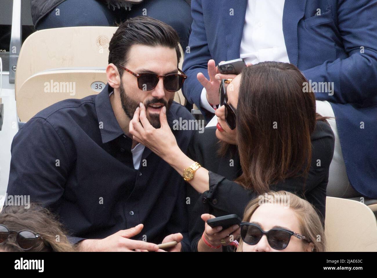 Sofia Essaidi, Adrien Galo in the stands during French Open Roland ...