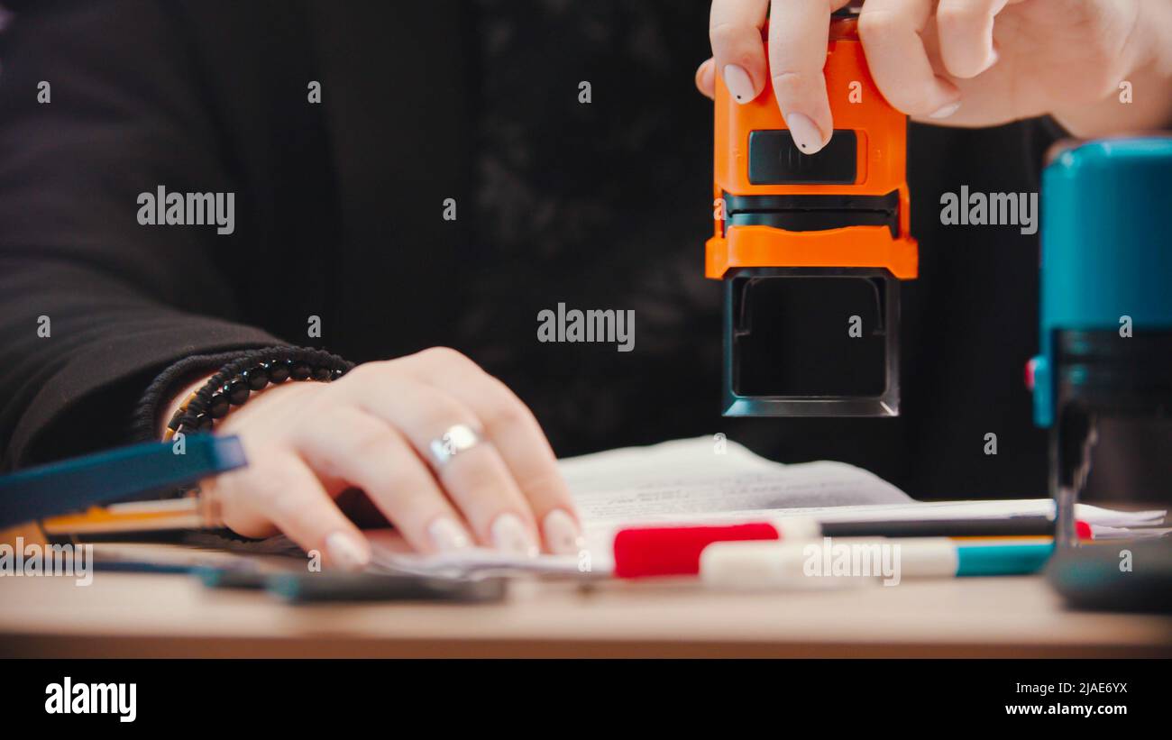 office concept - putting a stamp on the document Stock Photo - Alamy