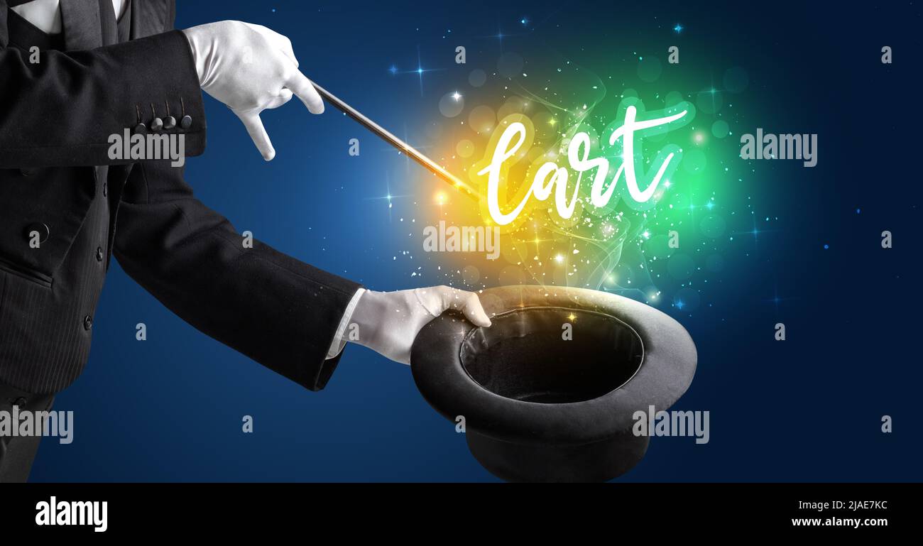 Young magician is showing magic trick Stock Photo - Alamy